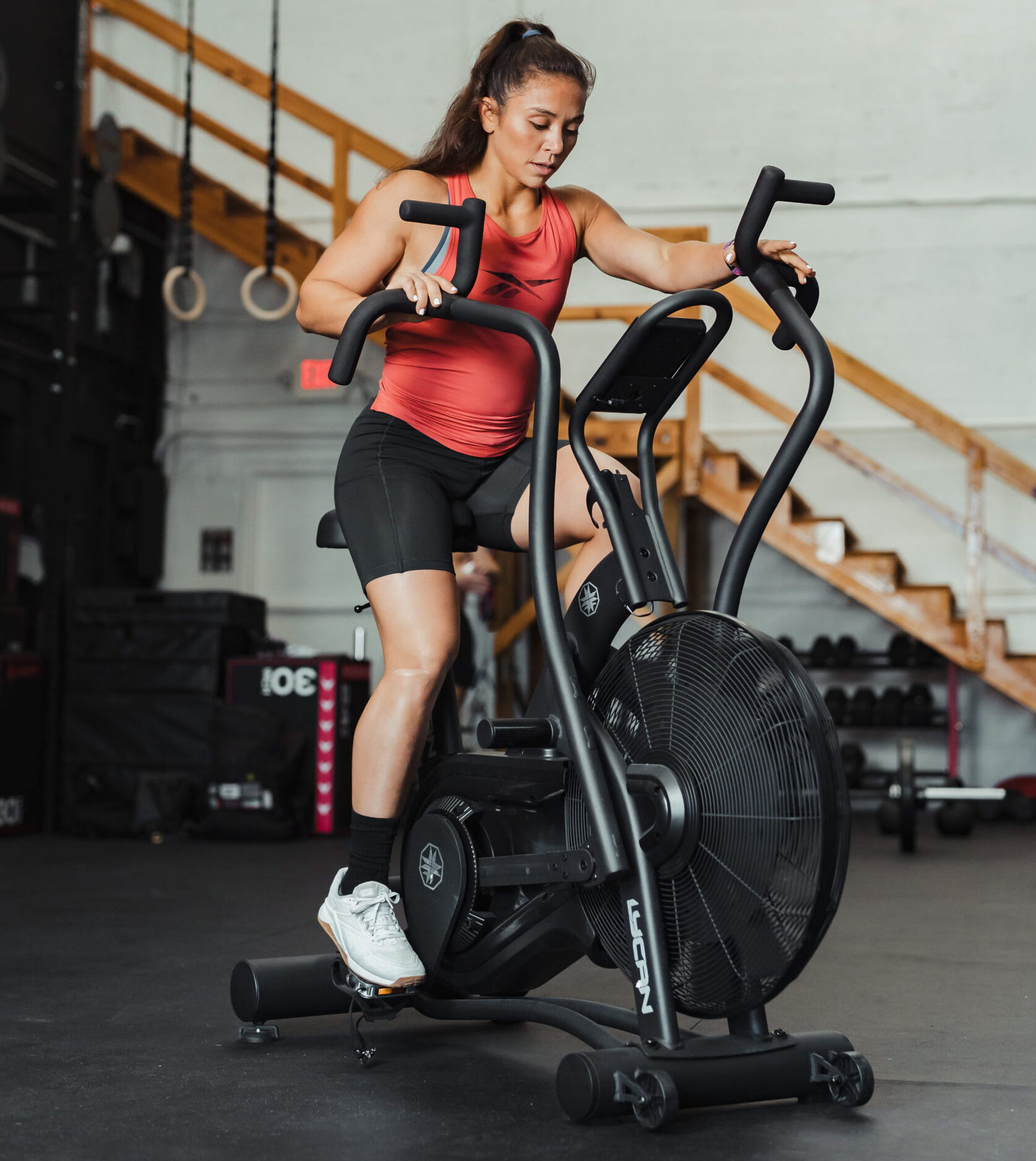 How Does The Air Bike Help Construct Power Endurance - Lycan Fitness